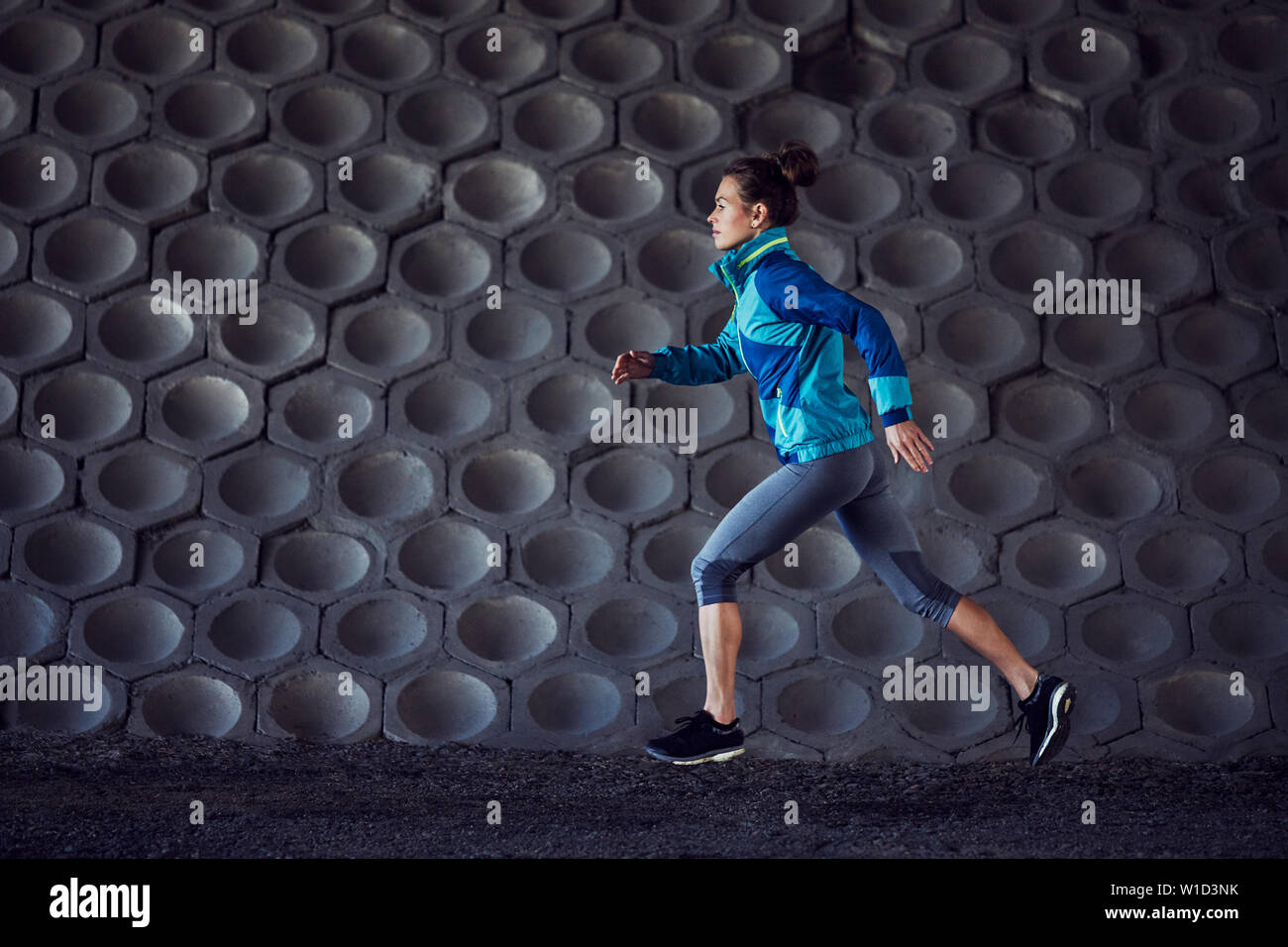 Caucasian woman running dark hi-res stock photography and images - Alamy
