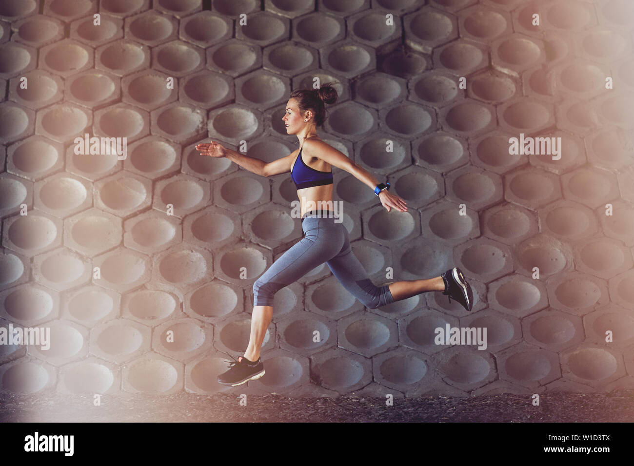 Fit woman running Stock Photo - Alamy