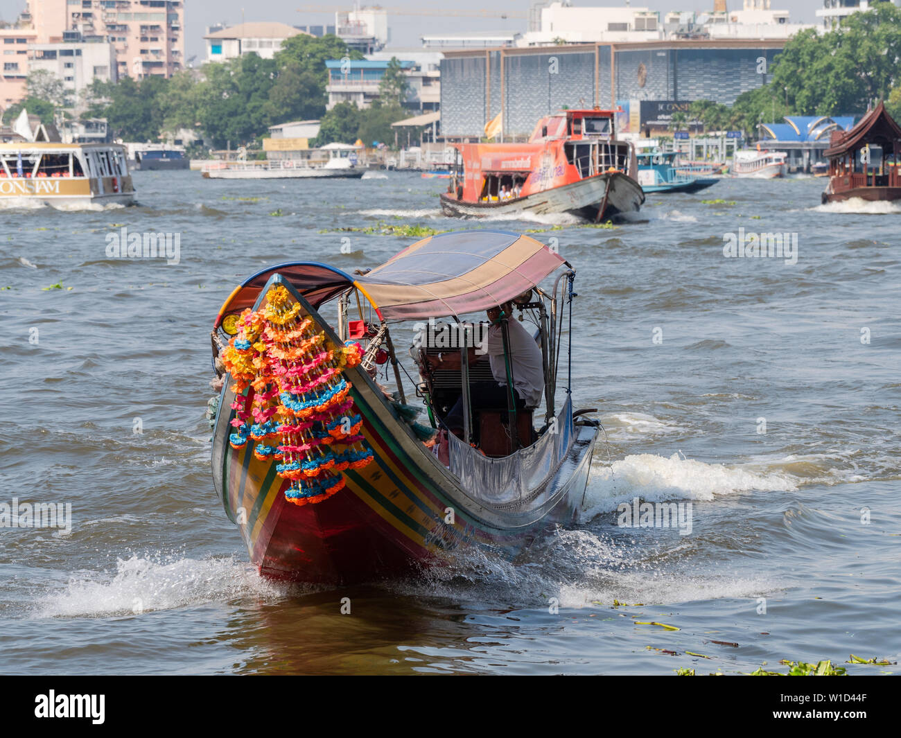 Bangkok, Thailand - January 26, 2019: Small passenger ferries represent ...