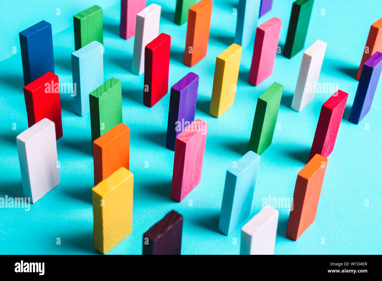 Colored dominoes in a row. Concept creative, logical thinking, art ...