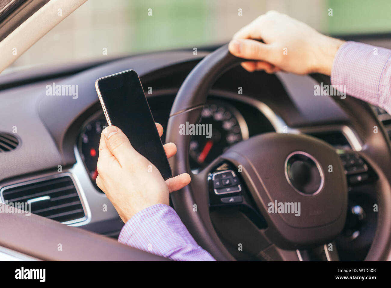 Close-up of a male hand in a modern car Stock Photo - Alamy