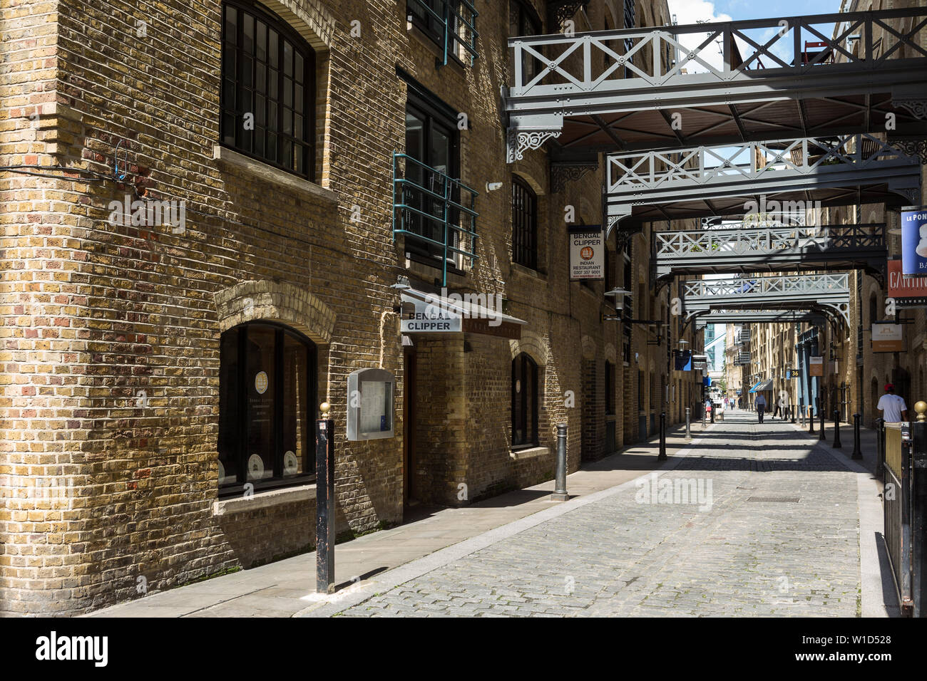 Shad Thames is a historic riverside street next to Tower Bridge in ...