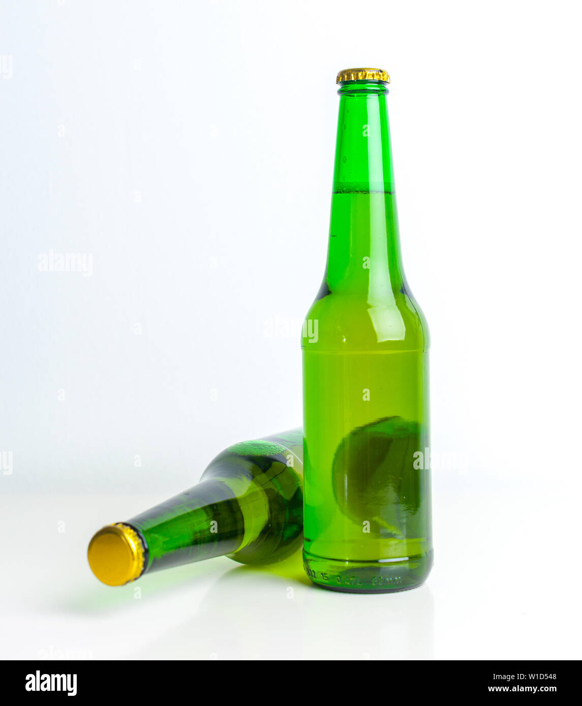 Row of beer bottles Stock Photo - Alamy