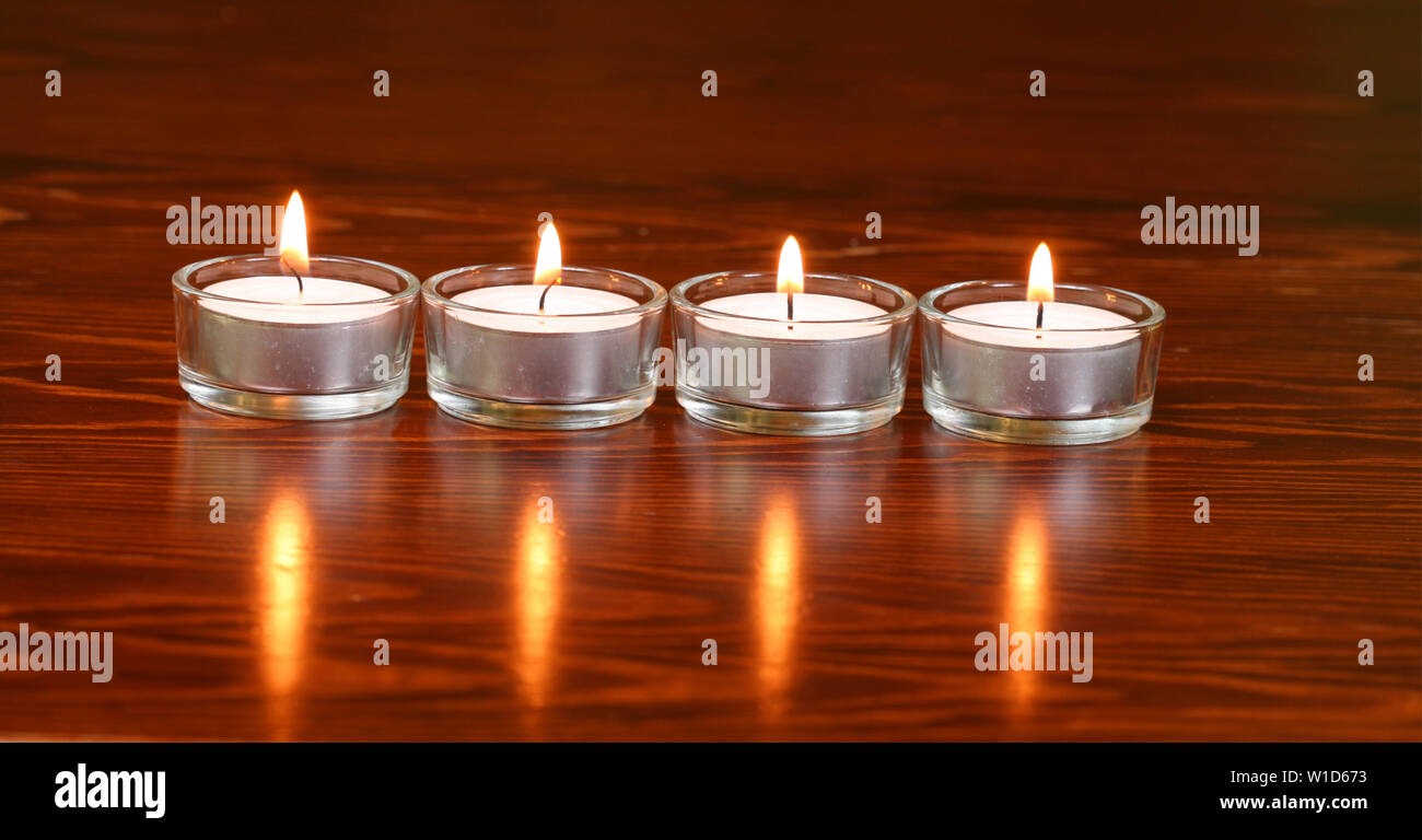 Lighting line tea candles hi-res stock photography and images - Alamy