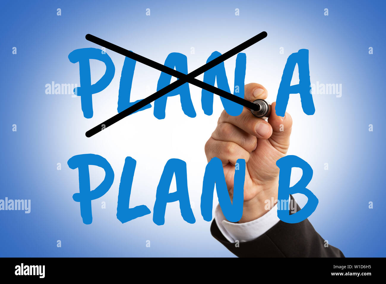 Closeup of man crossing plan a blue text using black marker as failure ...