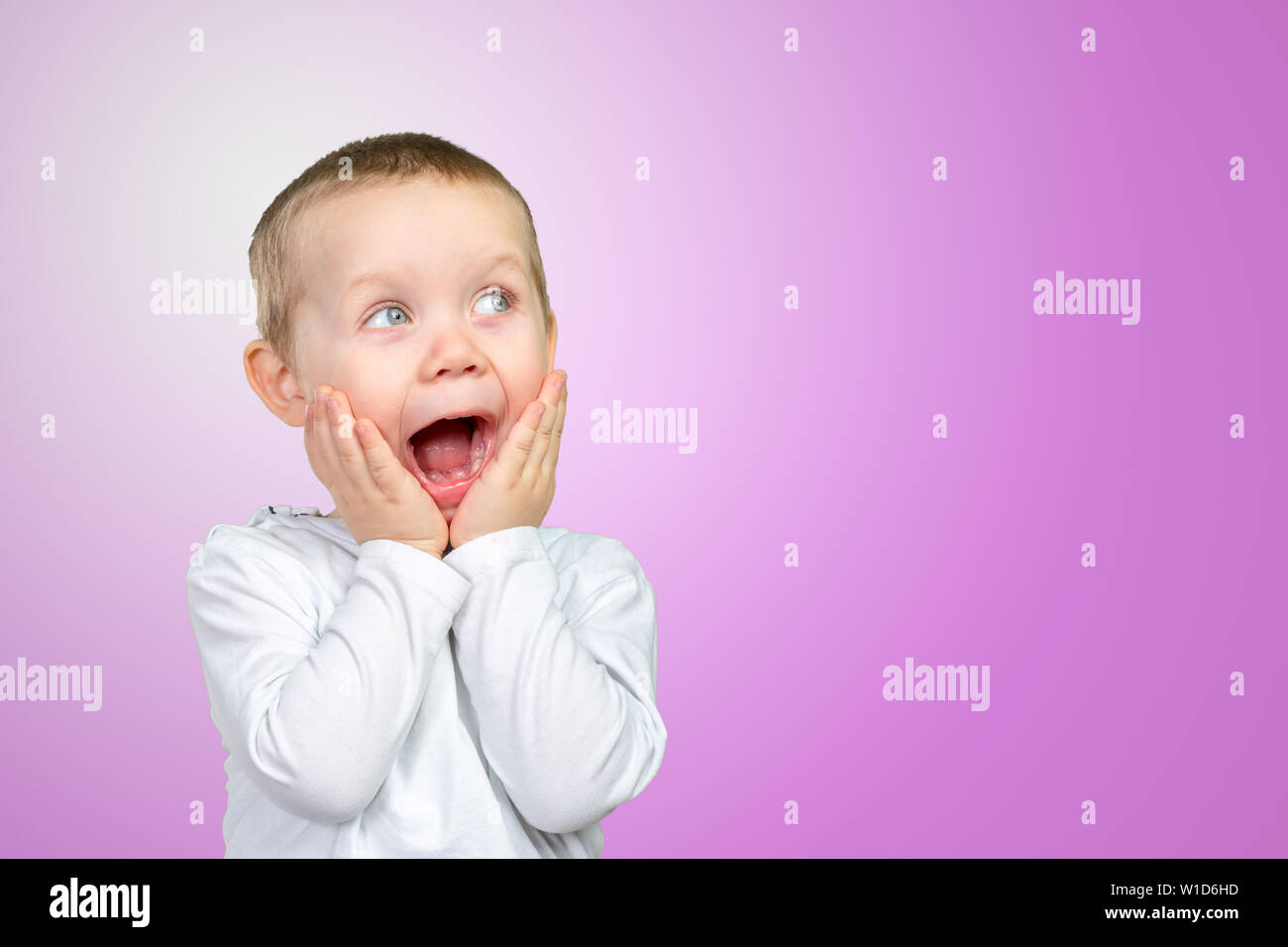 Child expressing surprise and happiness Stock Photo - Alamy