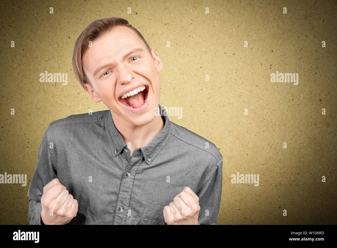 Angry man expressing aggression Stock Photo - Alamy