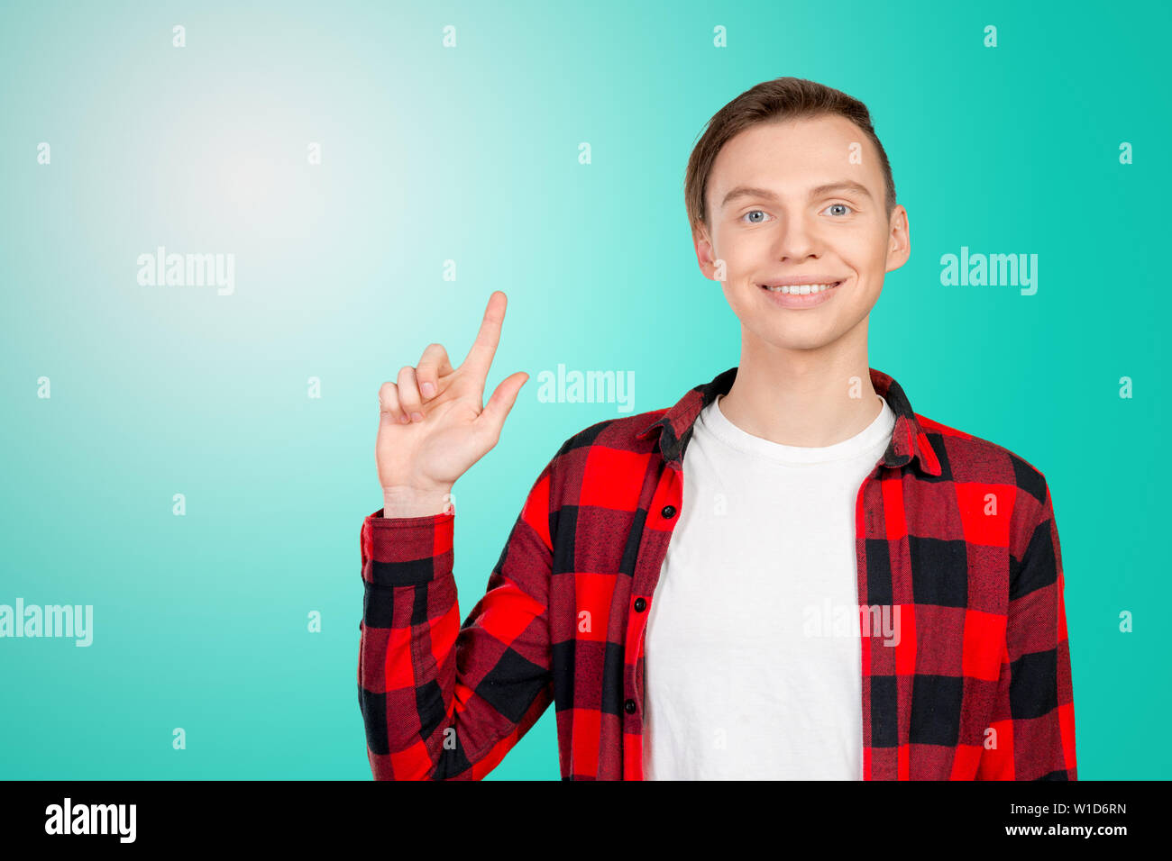 Man pointing copy space Stock Photo - Alamy