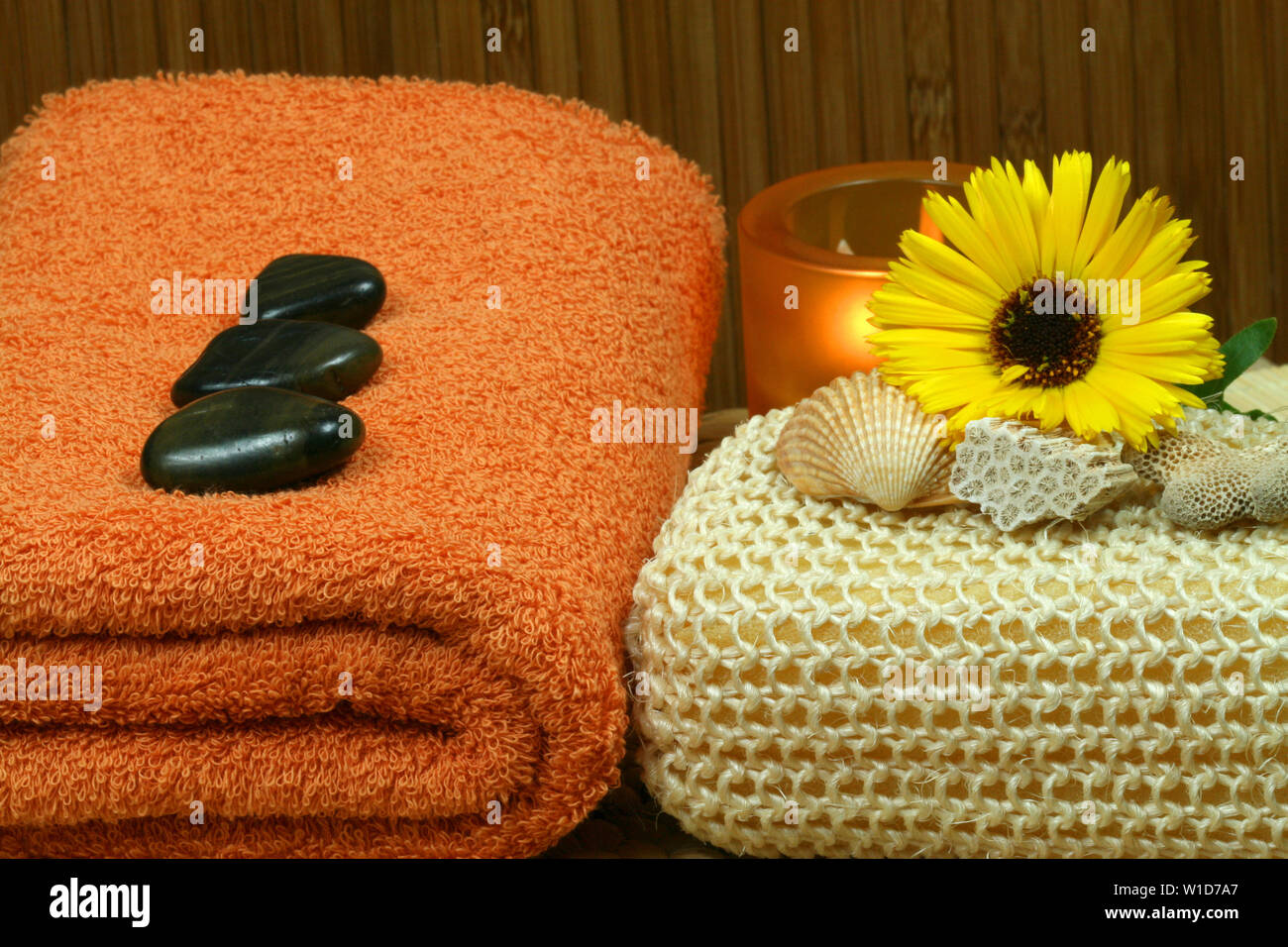 Beautiful natural composition of spa therapy objects, orange and yellow ...