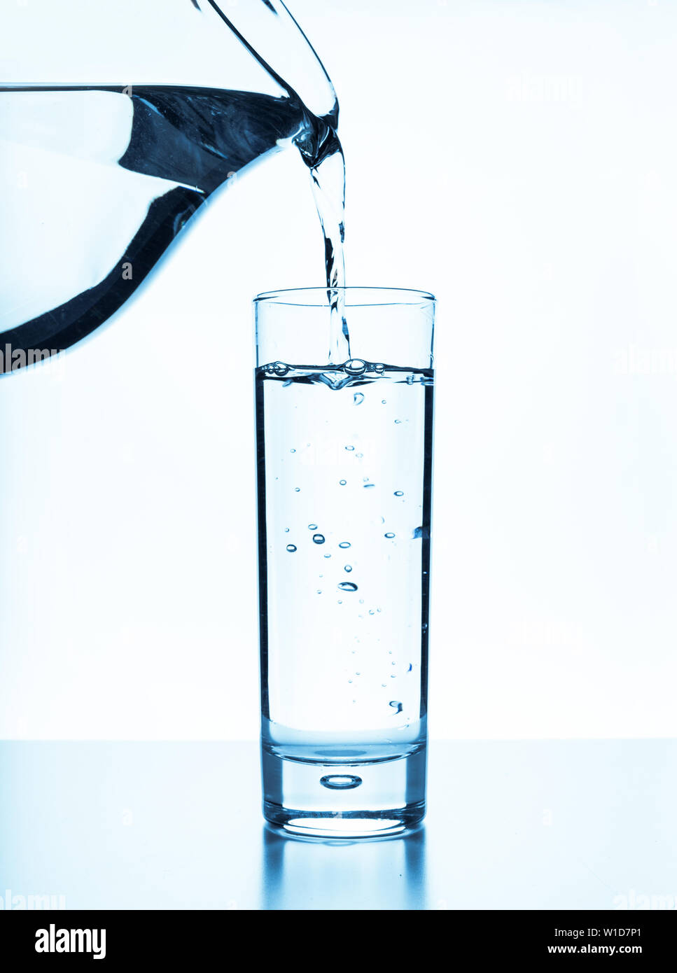 Pour water from pitcher glass hi-res stock photography and images - Alamy