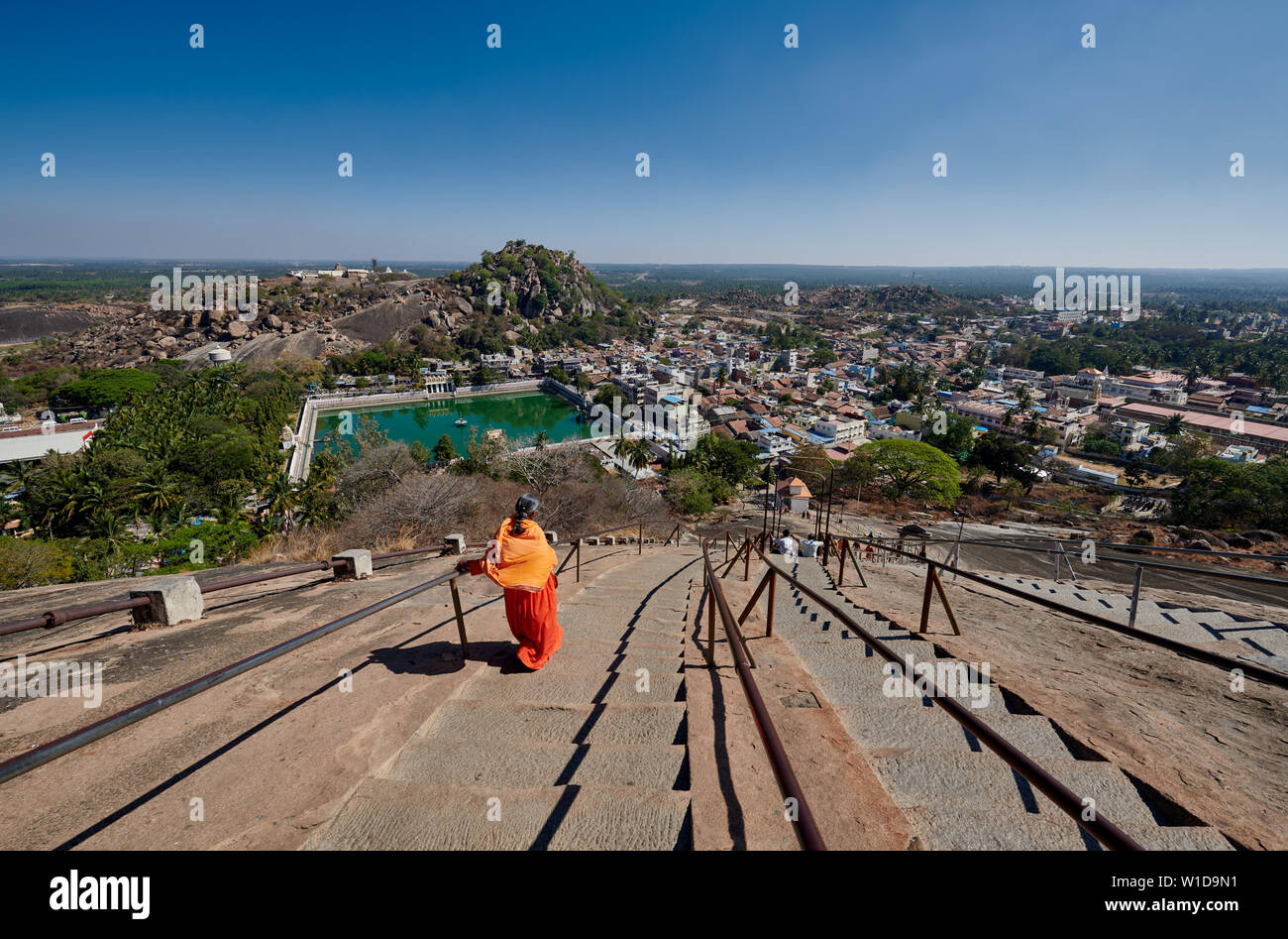 steps on steep hill to Shravanabelagola Jain temple with huge ...