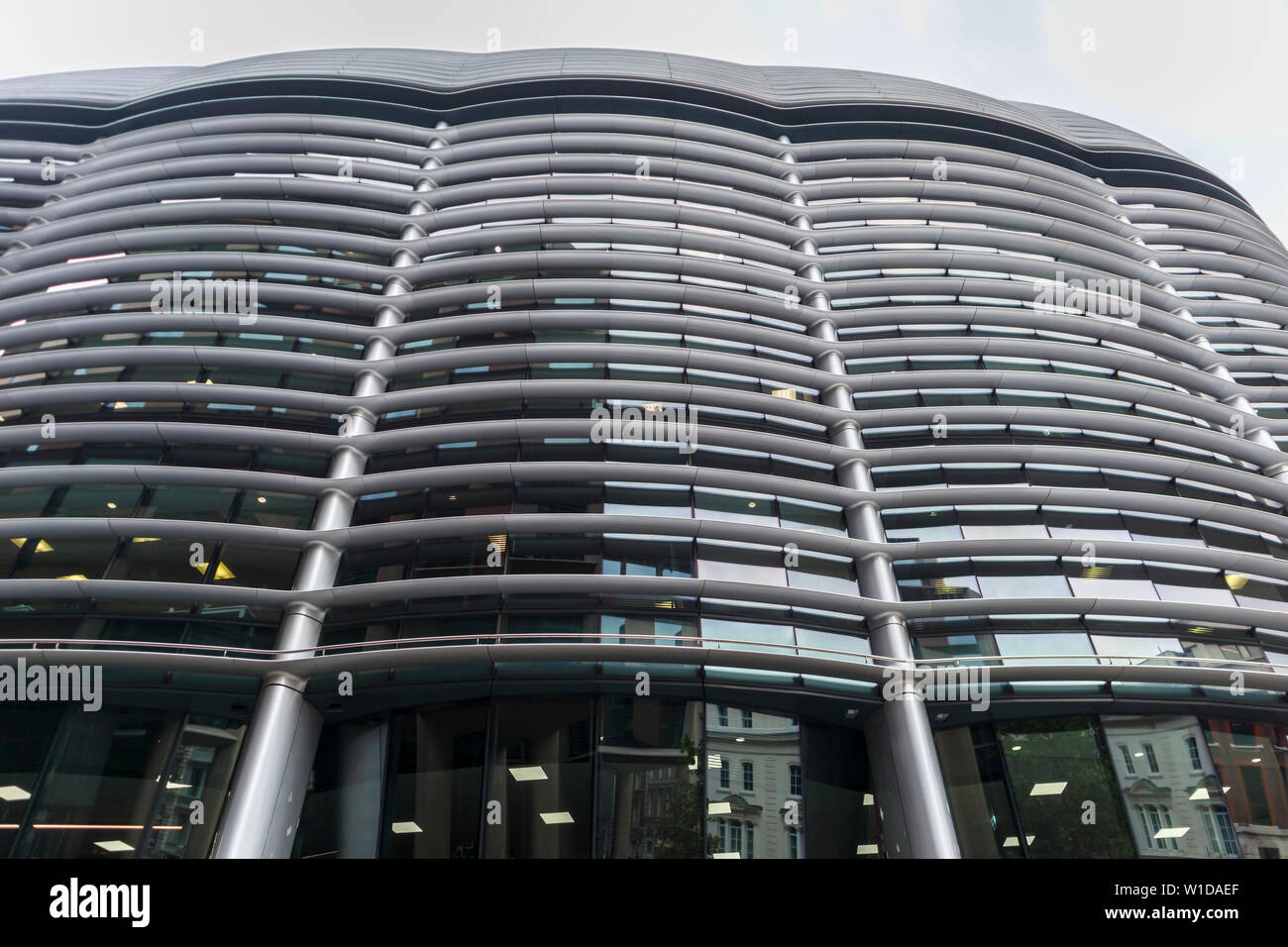 Curved solar shading (brise soleil) panels (louvres) on the side wall ...