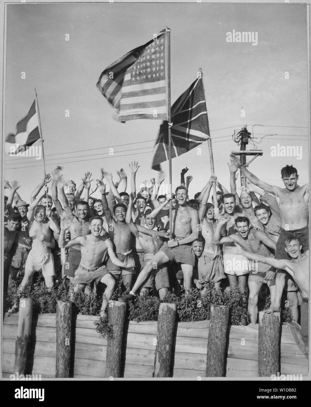Gaunt allied prisoners of war at Aomori camp near Yokohama cheer ...
