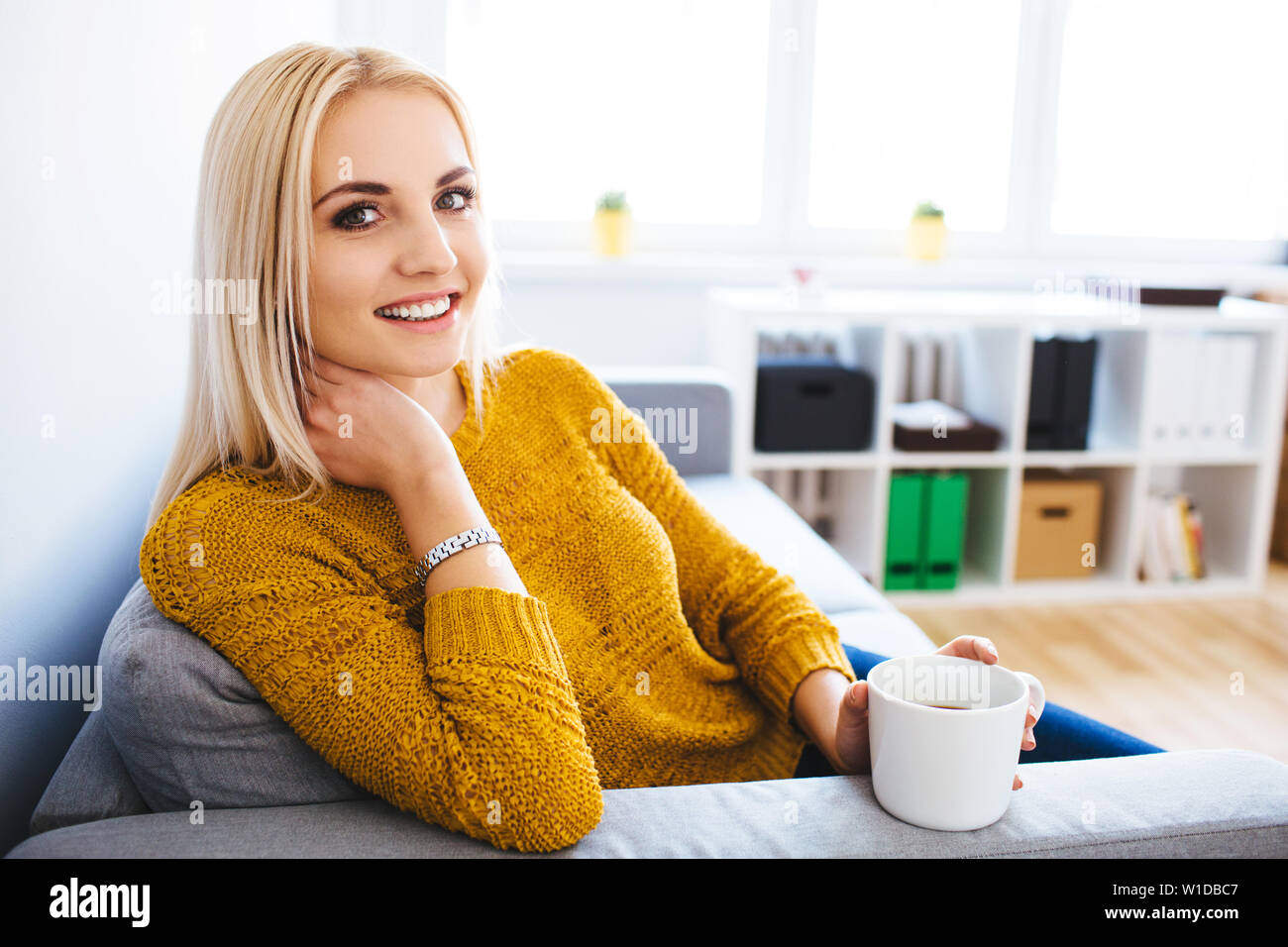 Young caucasian woman lounging in hi-res stock photography and images ...