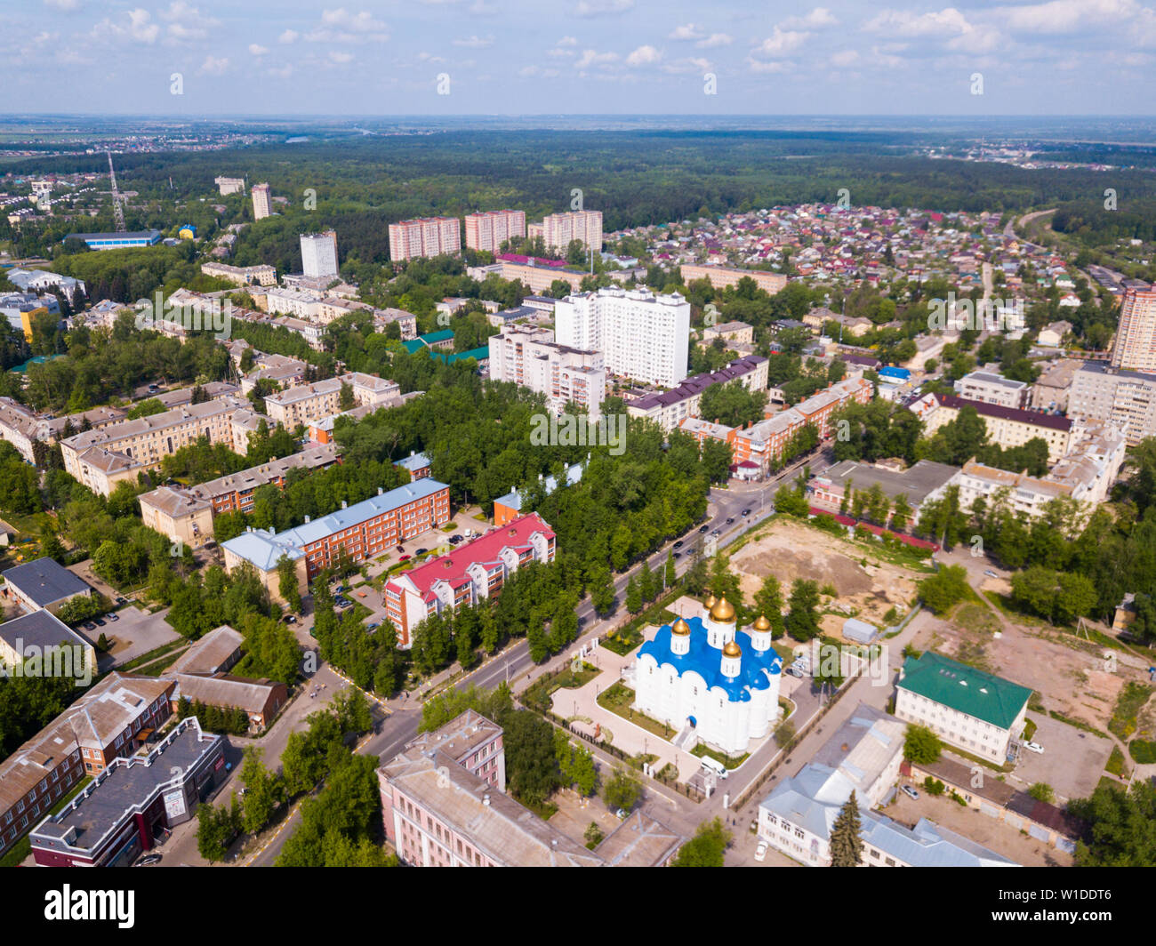 Aerial panoramic view of modern cityscape of Voskresensk overlooking ...