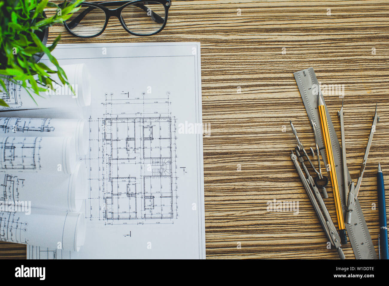 Project drawings and tools, close up Stock Photo - Alamy