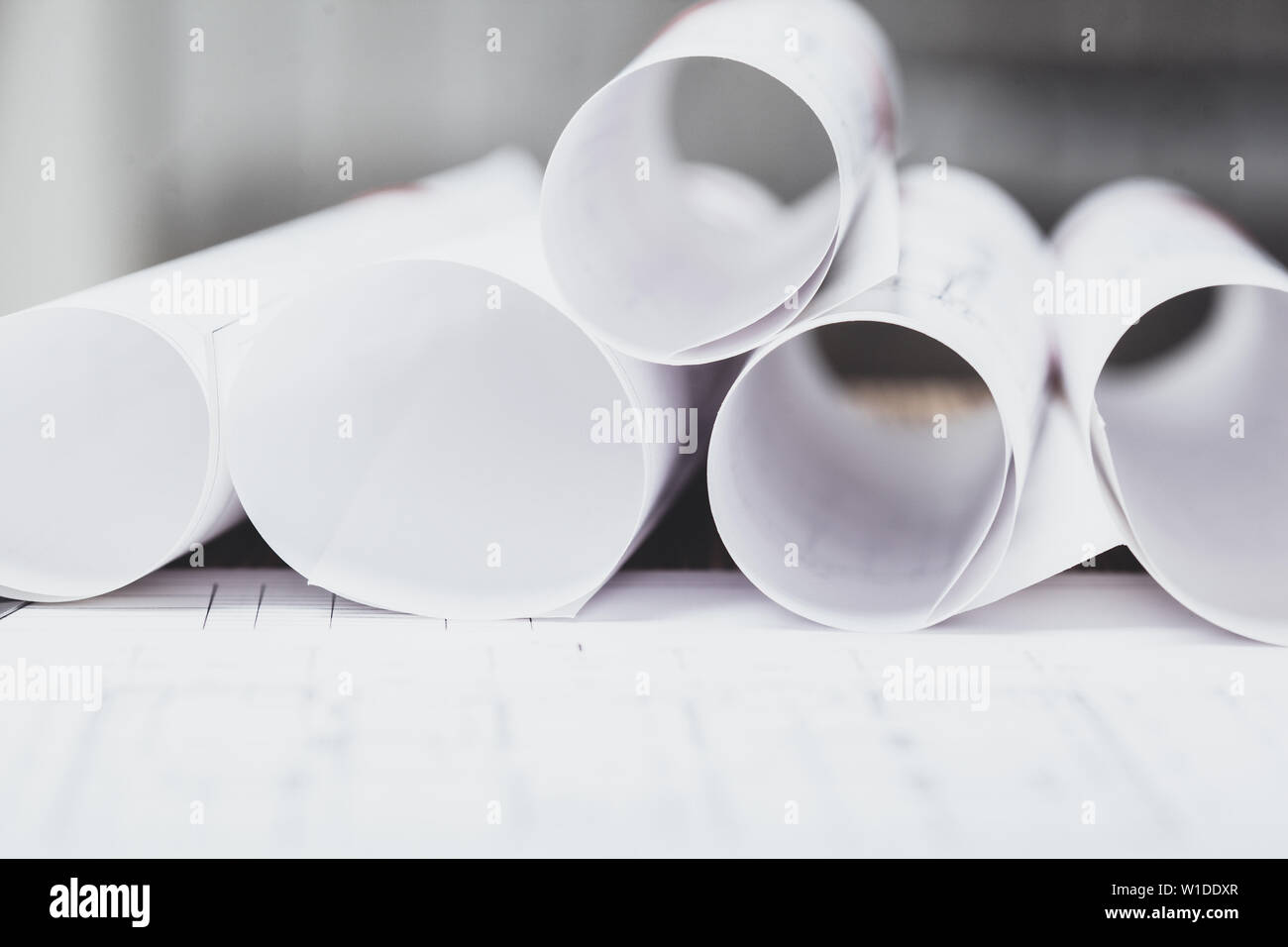 stack of white construction blueprints Stock Photo - Alamy