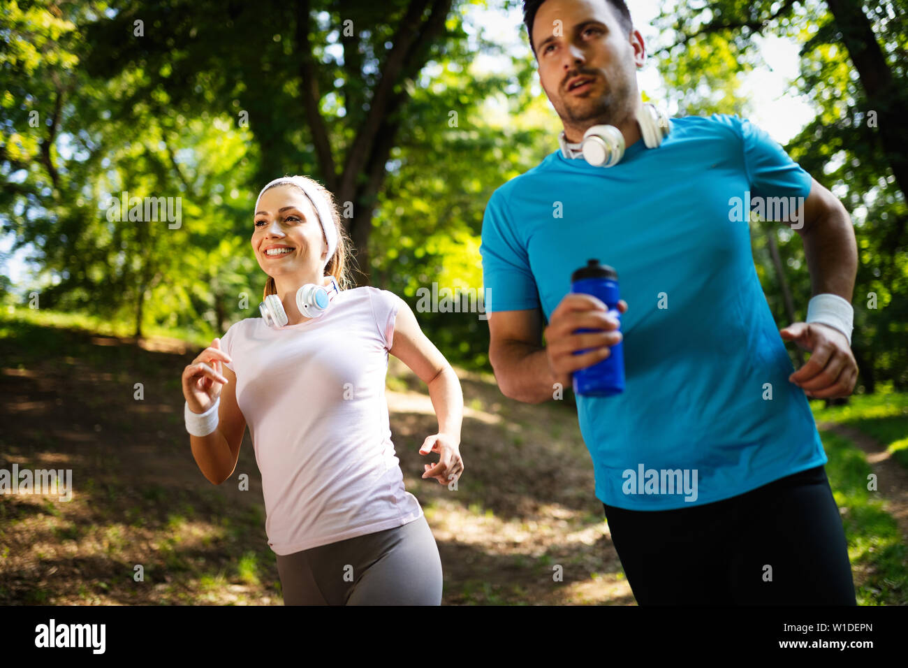 Fitness training for couple in love outside Stock Photo - Alamy