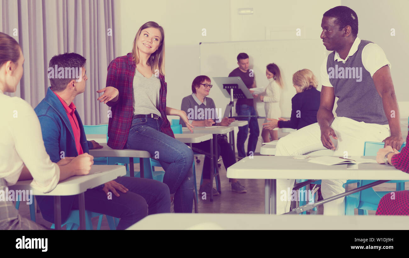 Group discussion between teacher hi-res stock photography and images ...