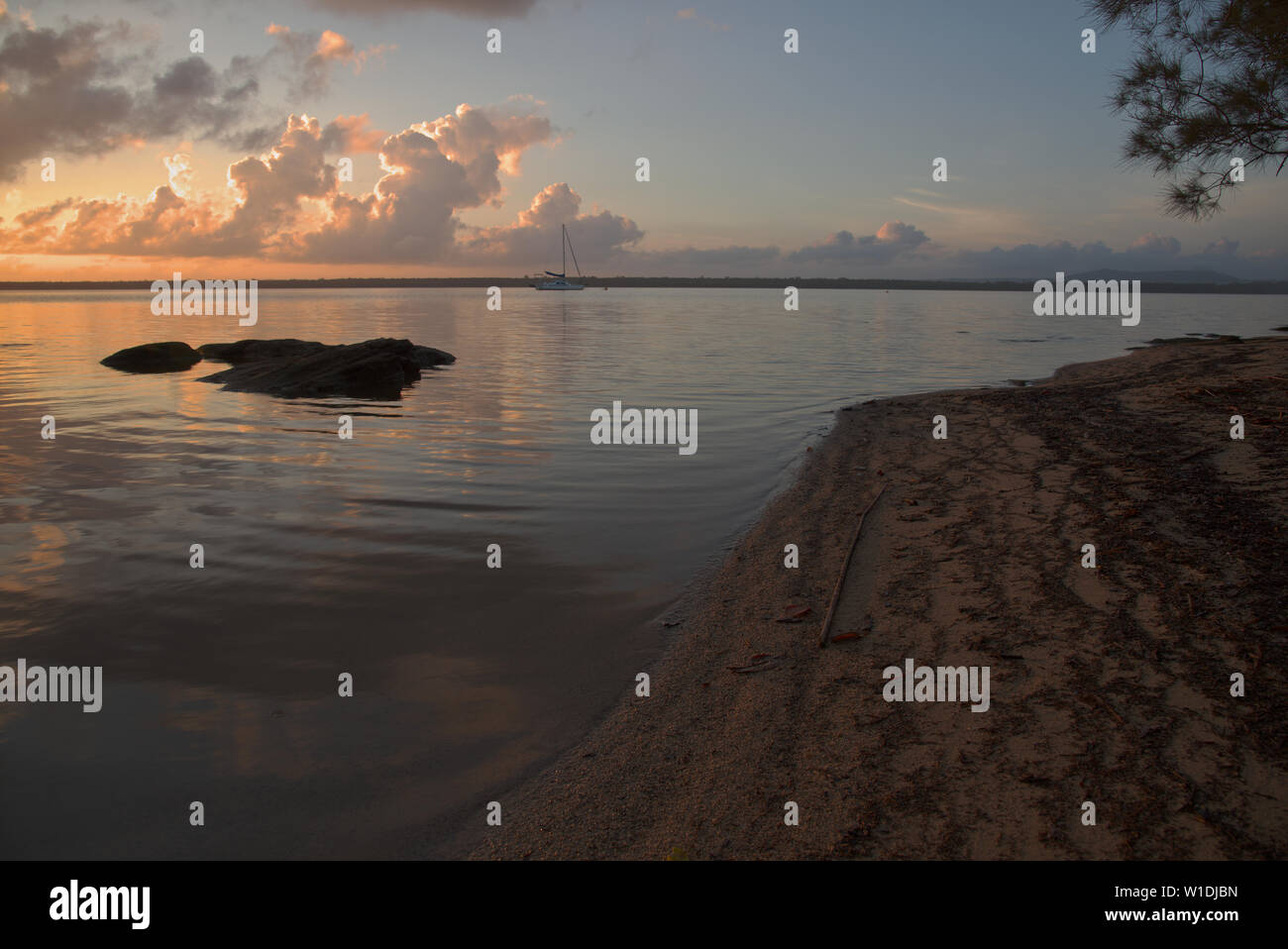 Sunrise over a calm lake in Queensland, Australia Stock Photo - Alamy