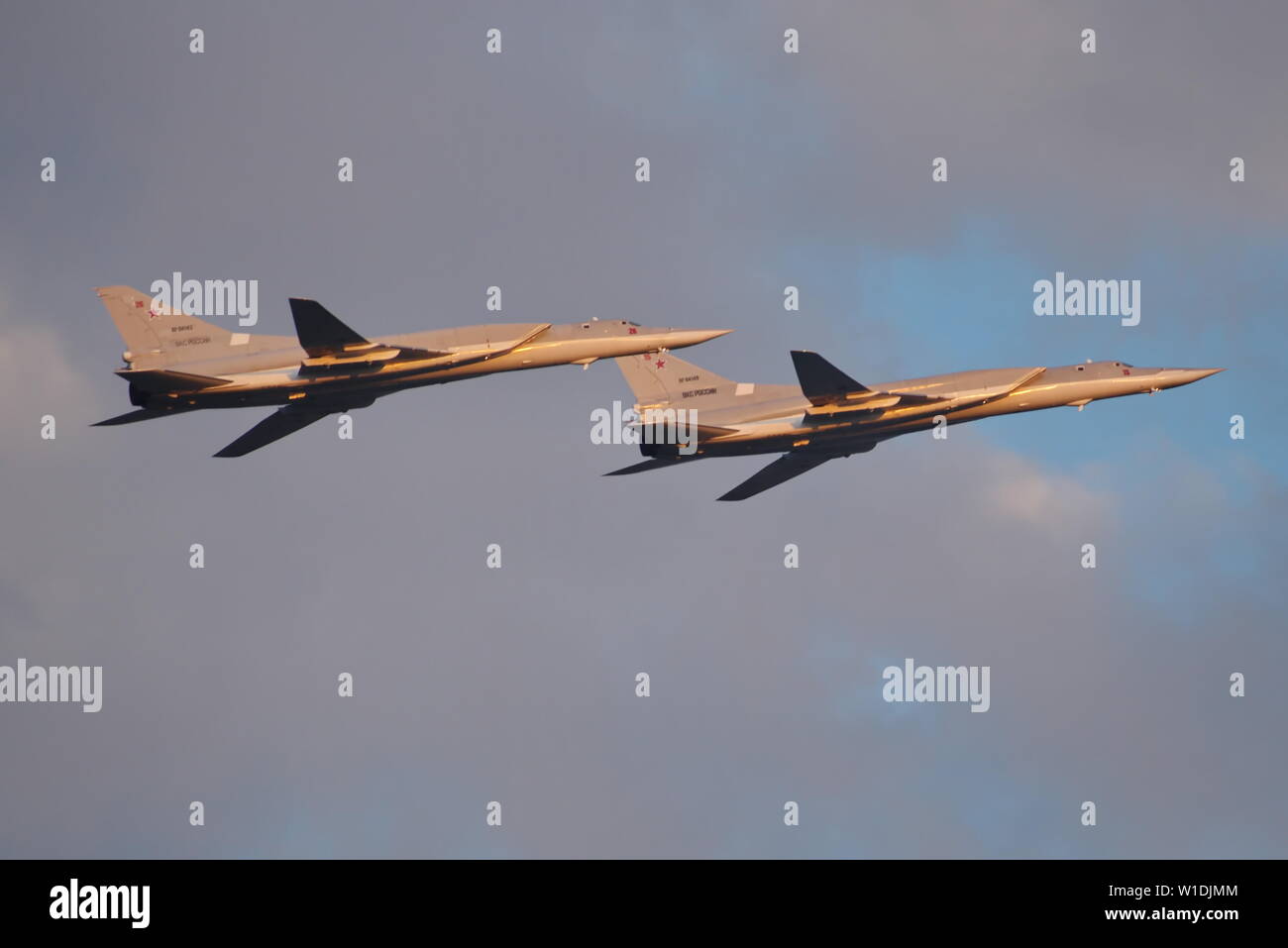 Minsk, Belarus - July 1, 2019 Flight of aircraft over the city, a group ...