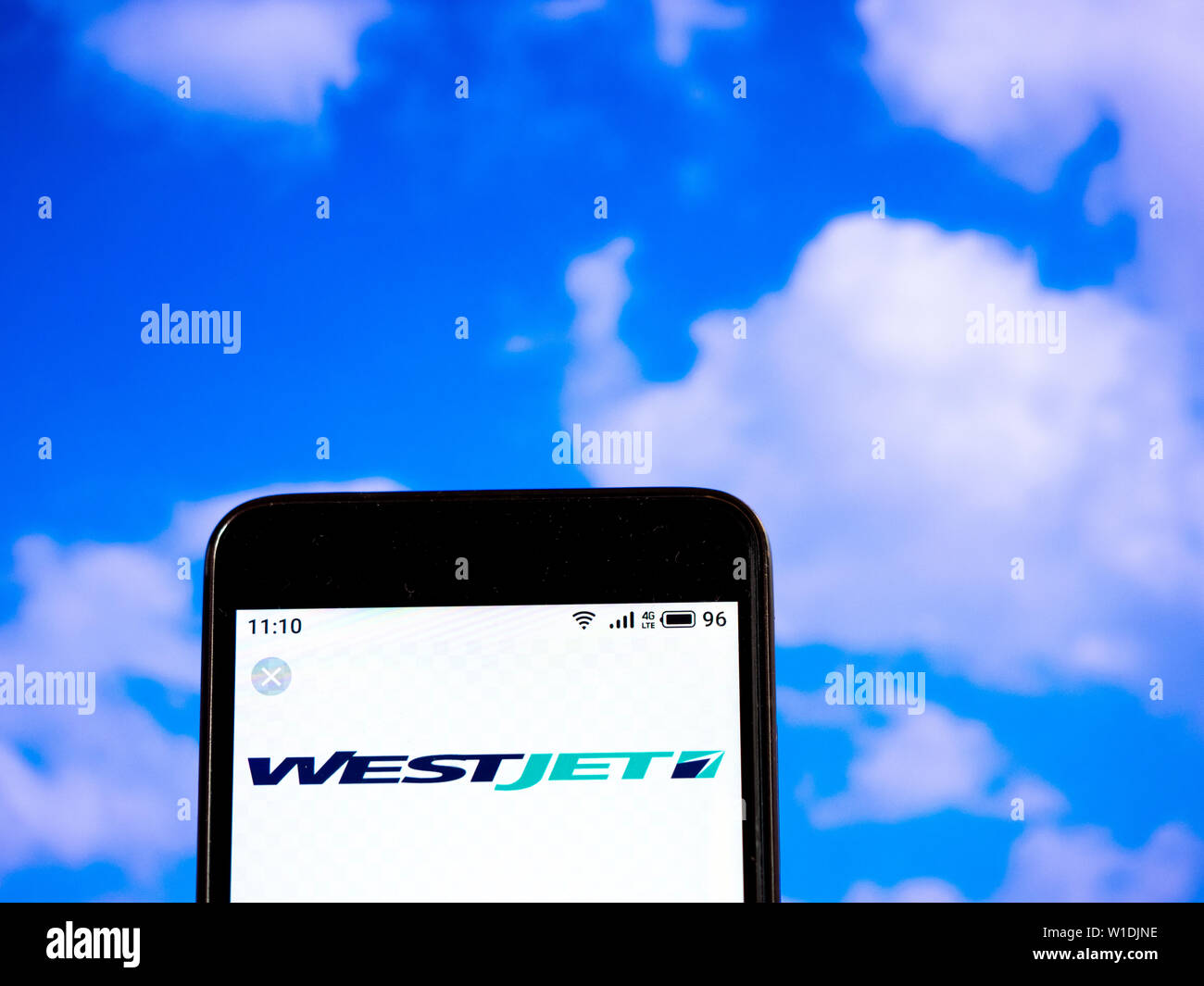 In this photo illustration the WestJet Airlines Ltd. logo is seen ...