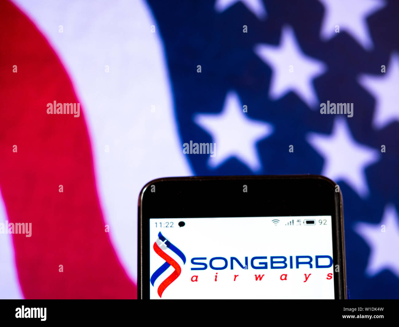 In this photo illustration the Songbird Airways logo is seen displayed ...