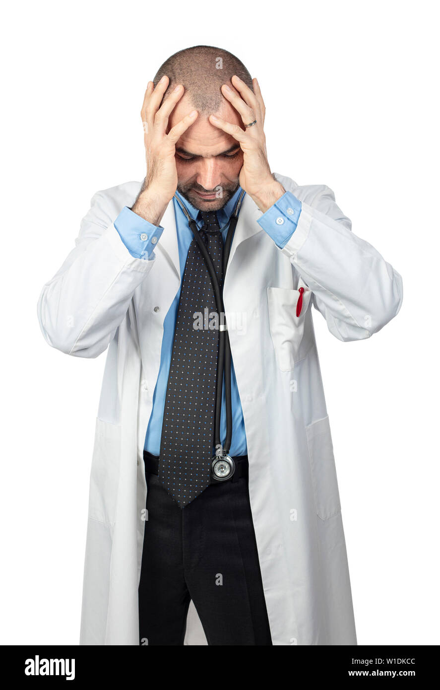 Desperate Doctor Holds His Head In His Hands Wears A White Coat