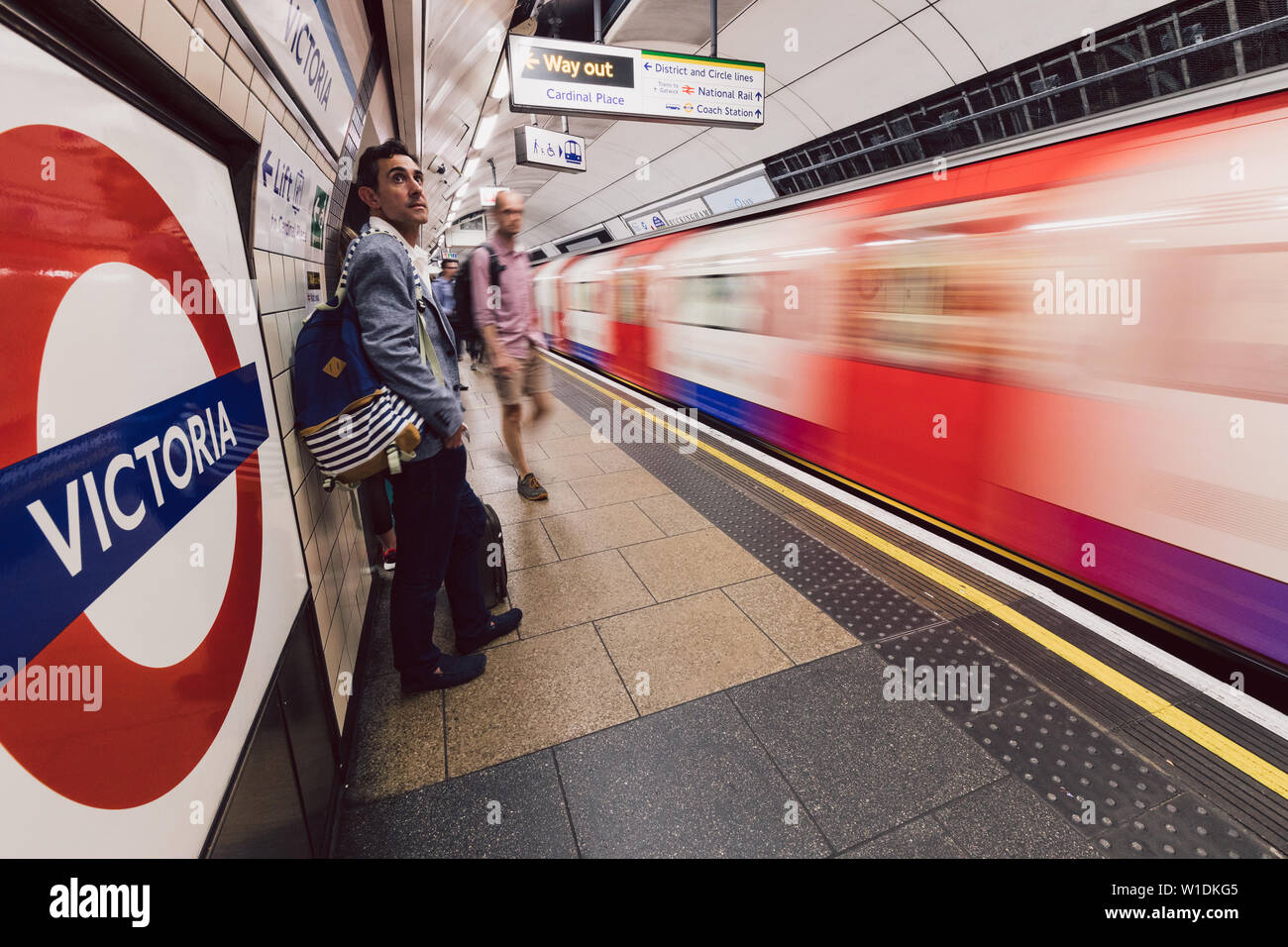 LONDON - JUNE 26, 2019: Train arriving at platform at Victoria tube ...