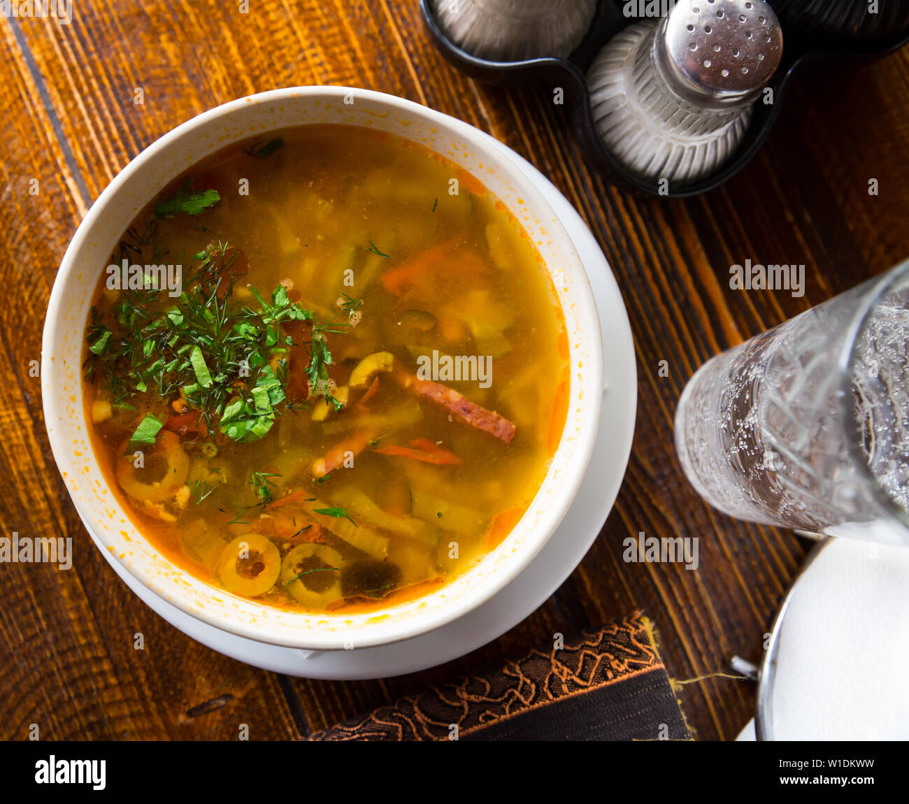 Russian cuisine - solyanka soup with various ingredients Stock Photo ...