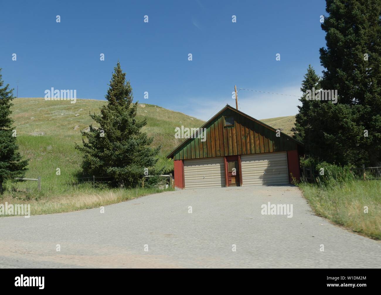 Farm structure along the road at the Bighorn National Forest in ...