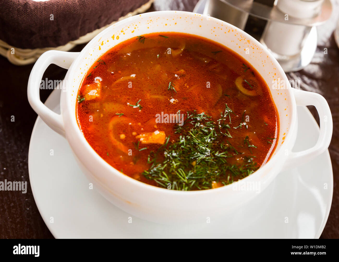 Russian cuisine - solyanka soup with various ingredients Stock Photo ...
