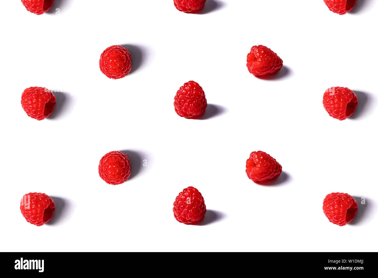 Pattern made of fresh raspberry isolated on white Stock Photo - Alamy