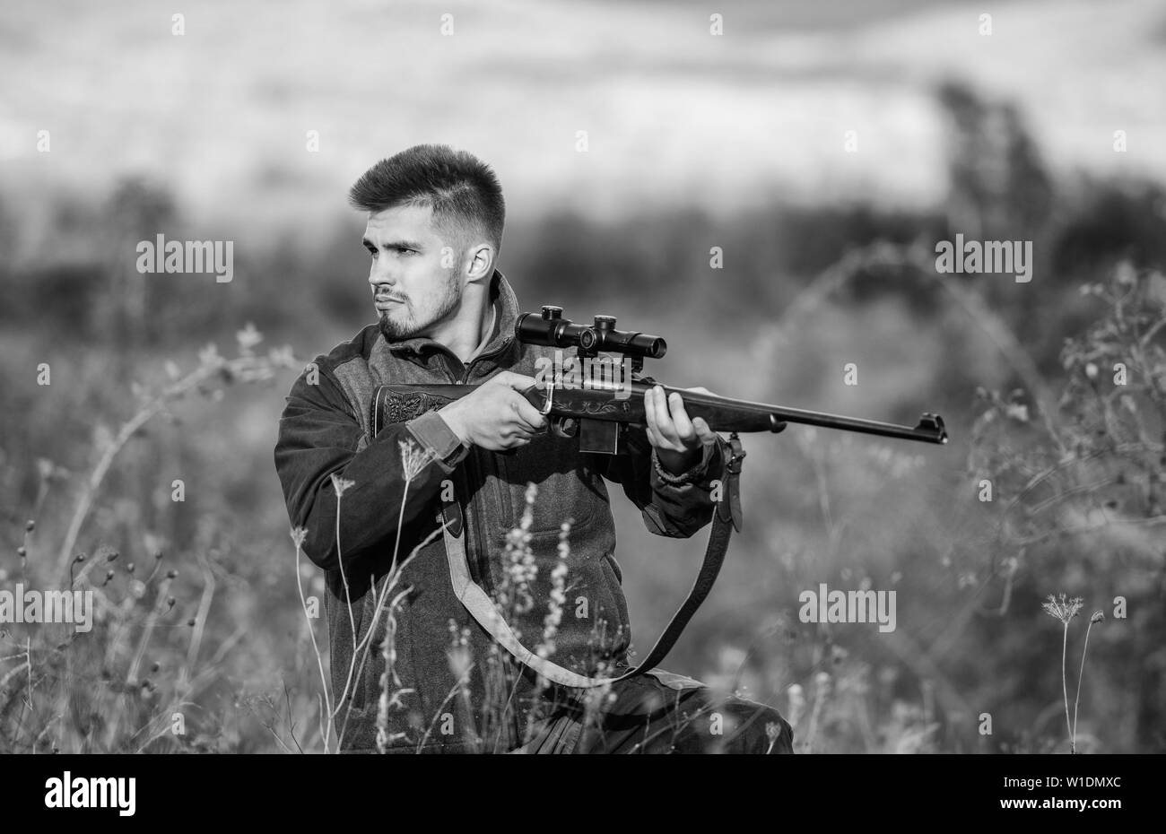 Hunting hunter brutal man Black and White Stock Photos & Images - Alamy