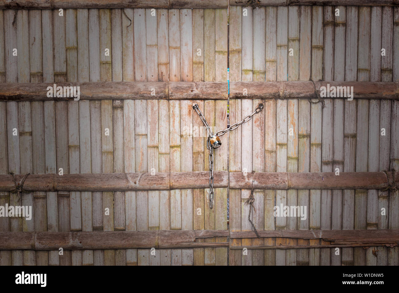 Old bamboo texture with chain locked key Stock Photo - Alamy