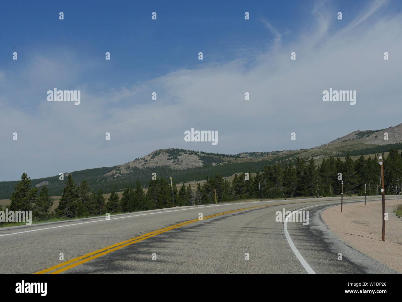 Scenic drive along Highway 16 through the mountains of Bighorn National ...