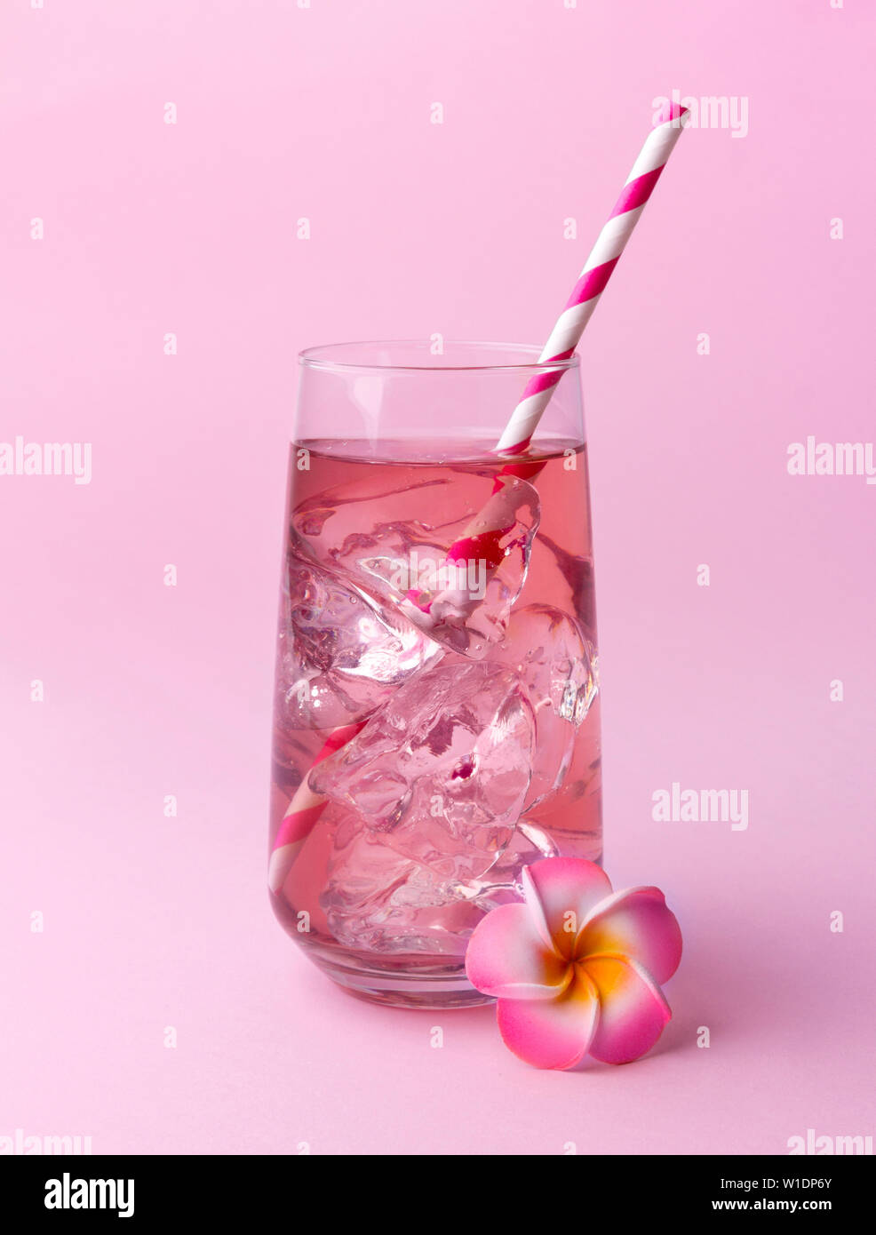 Summer refreshment drinks. Light pink rose cocktail on a pink ...