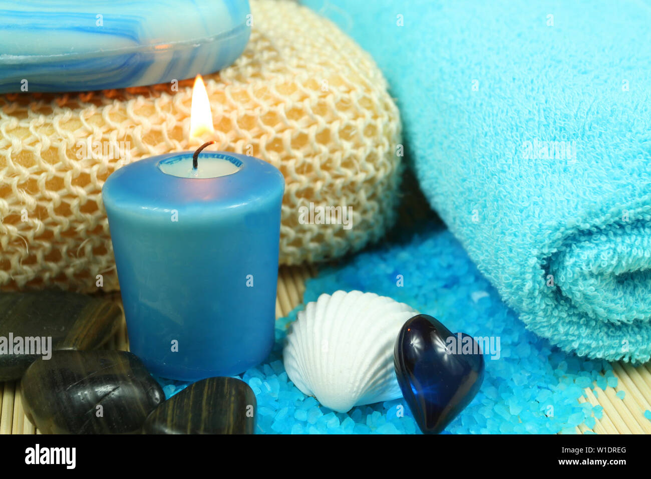 Spa soothe in blue color. Wellness therapy with pebbles, shell and ...