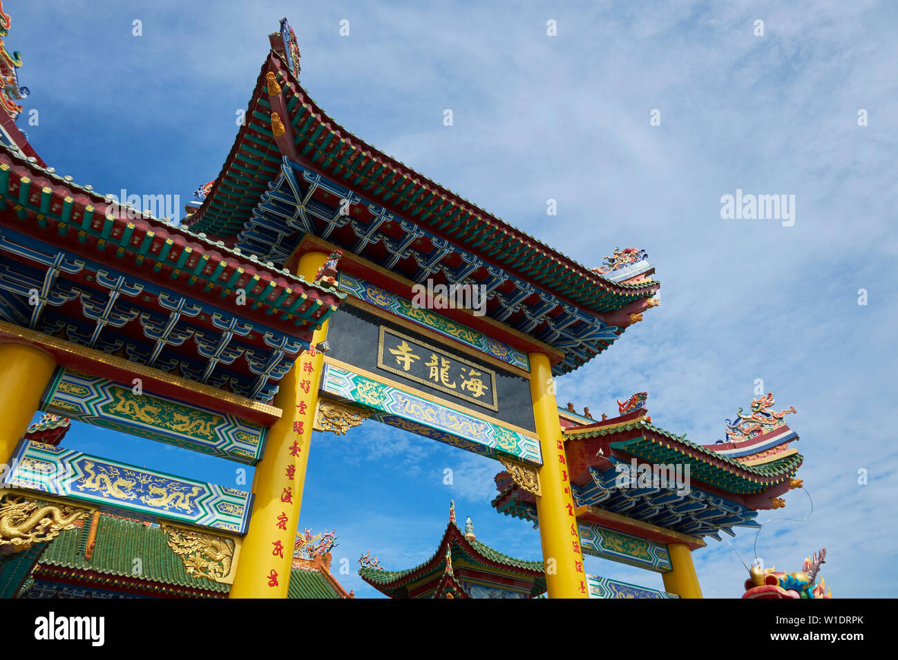 Front gate to the new, colorful Hai Long Si Chinese temple in Miri ...