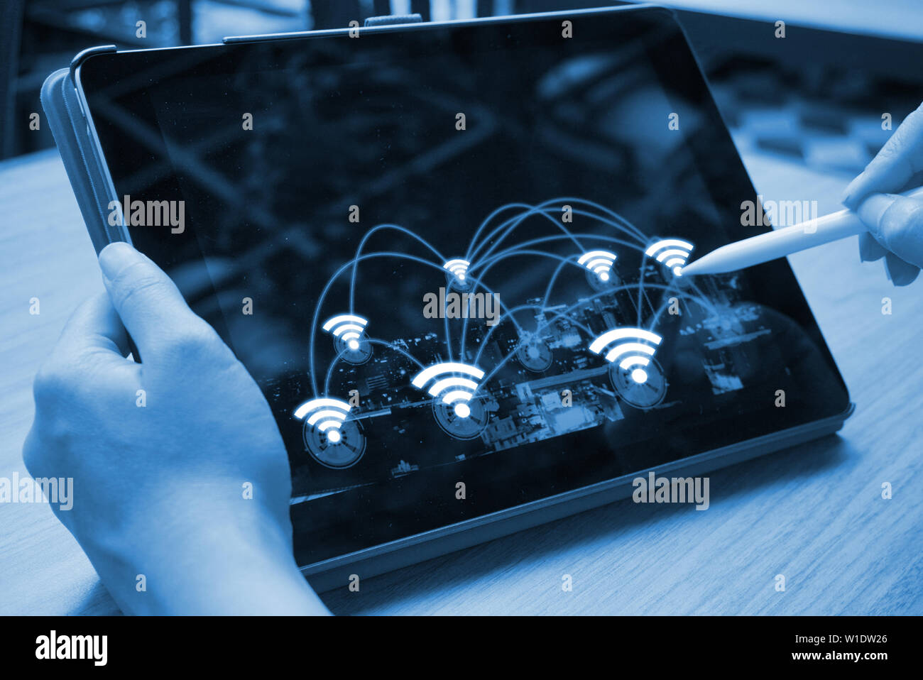 Hand holding tablet which show connection city signal network Stock ...