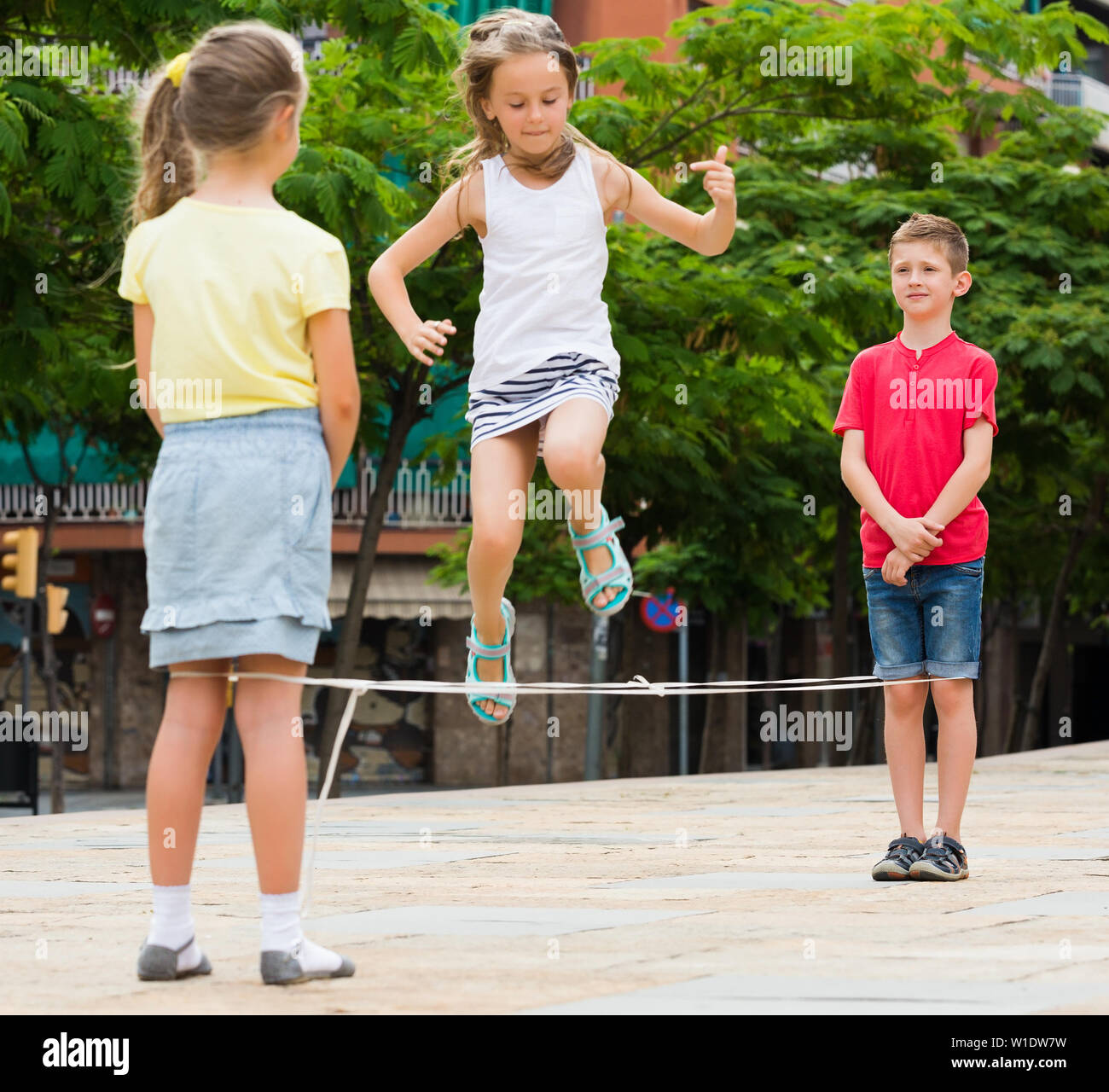 Children skipping park hi-res stock photography and images - Alamy