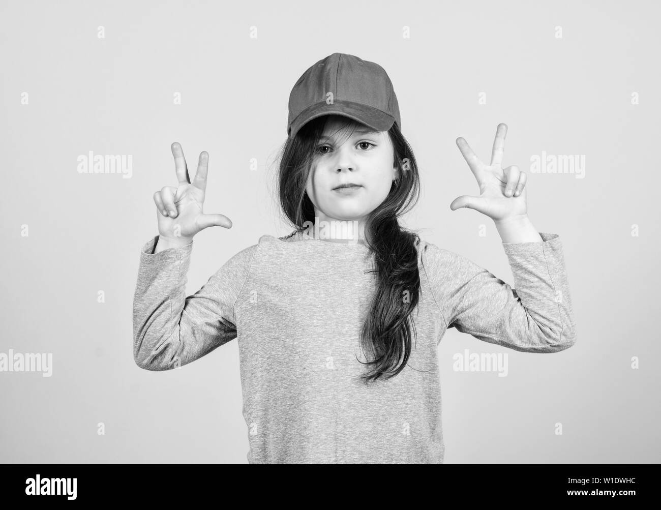 Fashionable little girl wearing cap hi-res stock photography and images ...