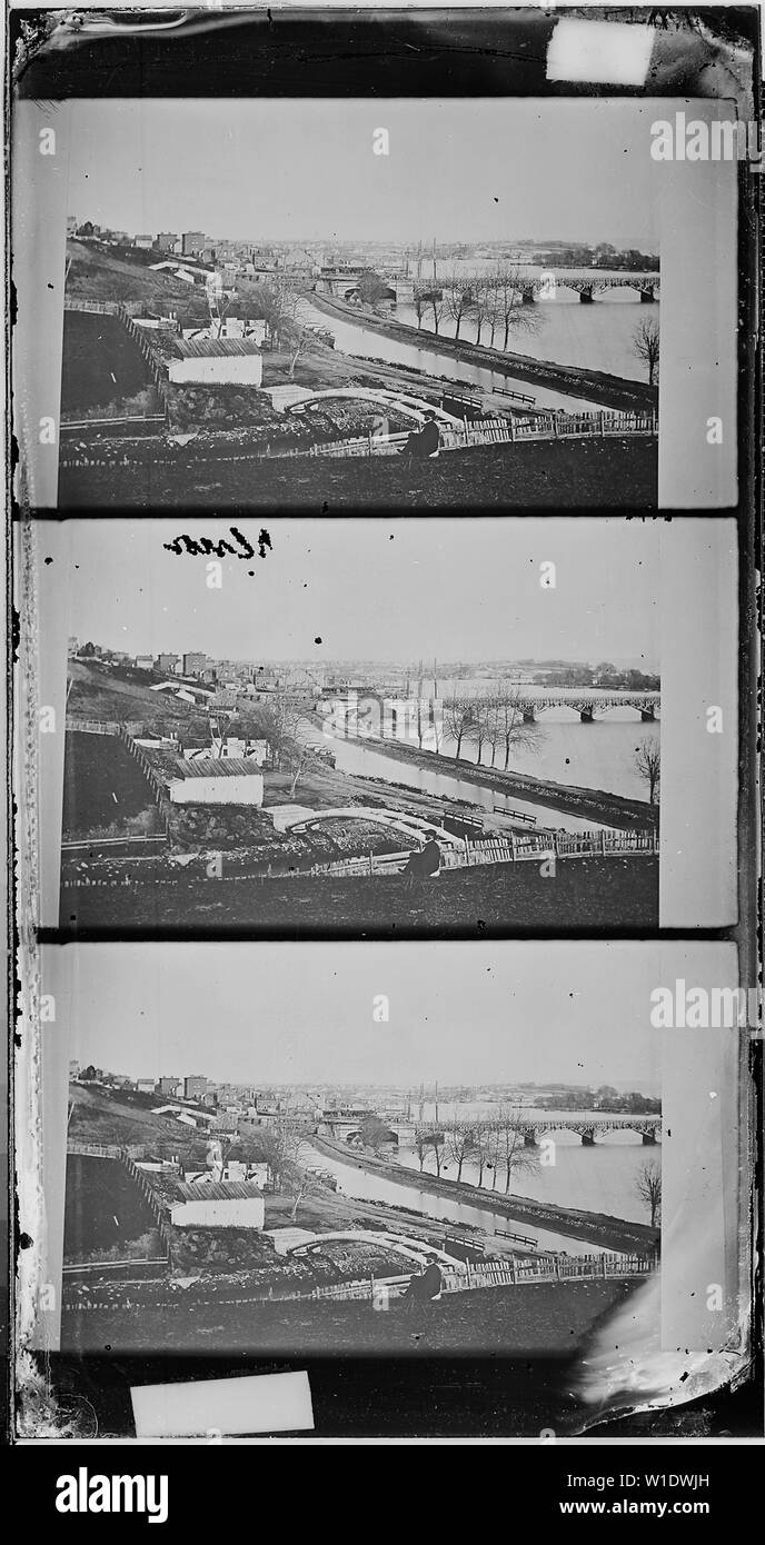 Georgetown and bridge across Potomac River. Canal in foreground Stock ...
