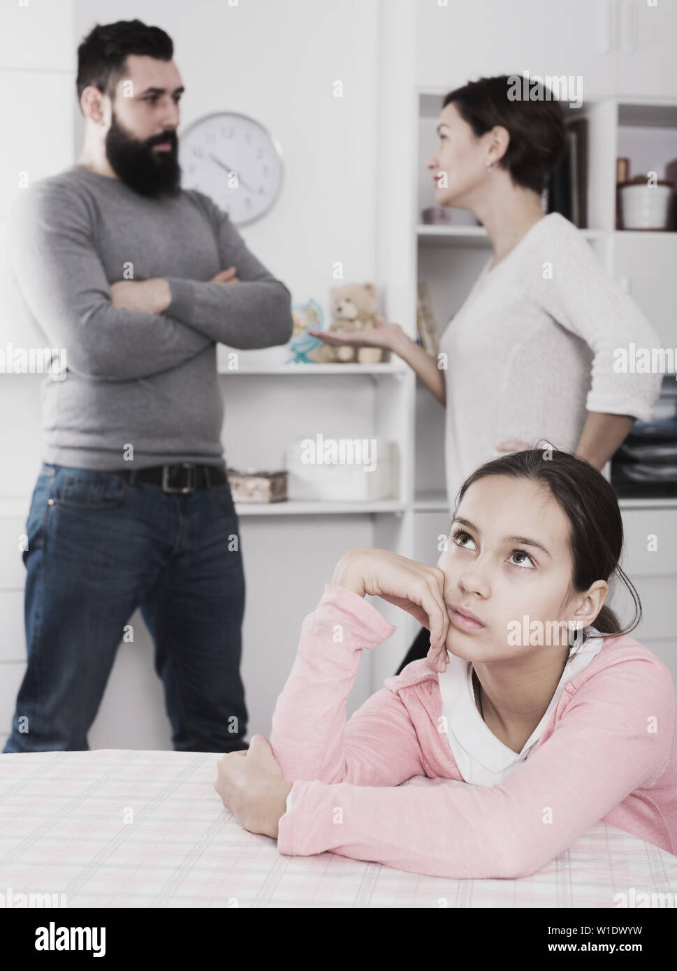 Father and mother having disagreement while their child at home Stock ...