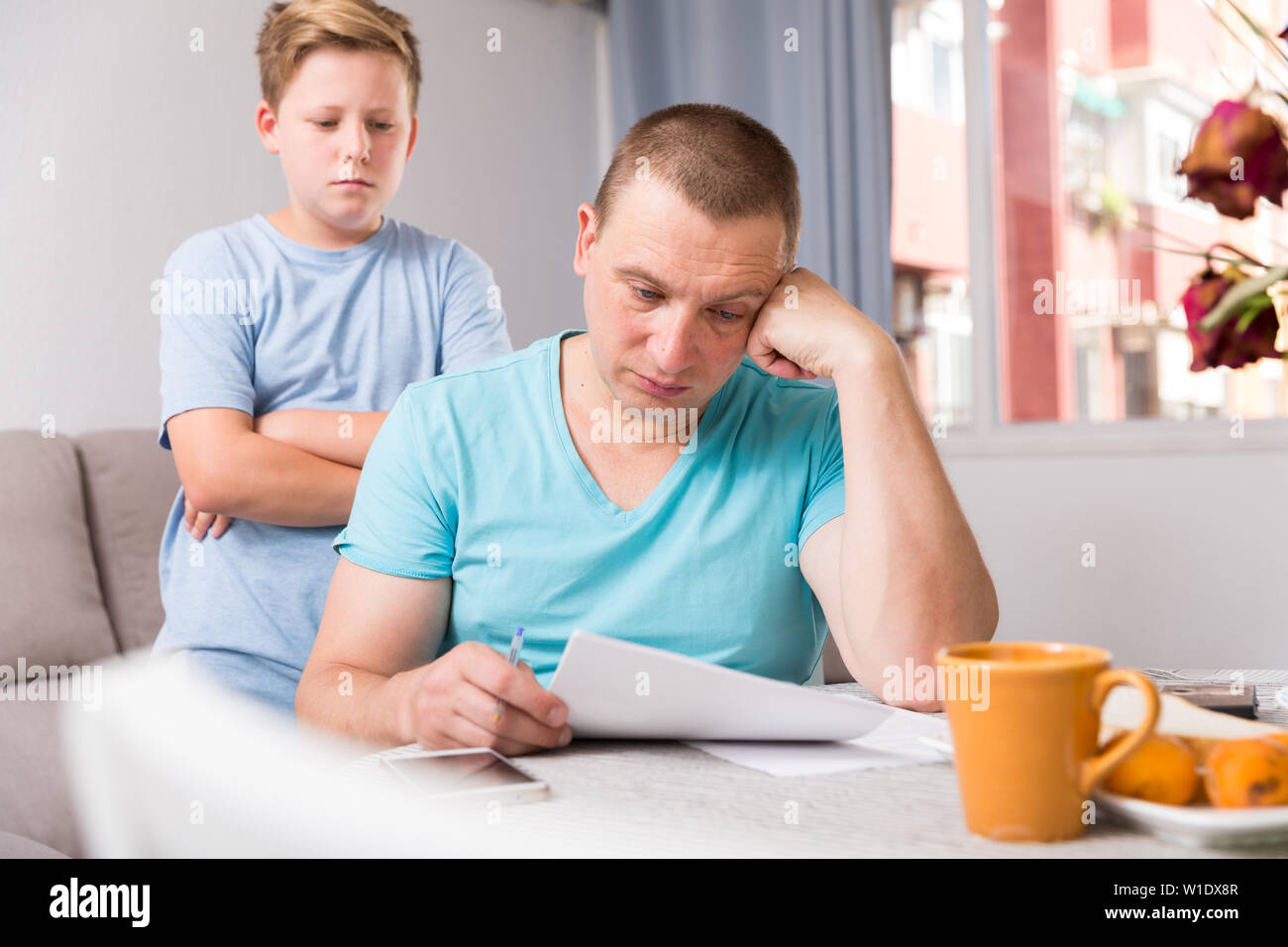 Teenage son is not wanting talk with his father in time conflict at the ...