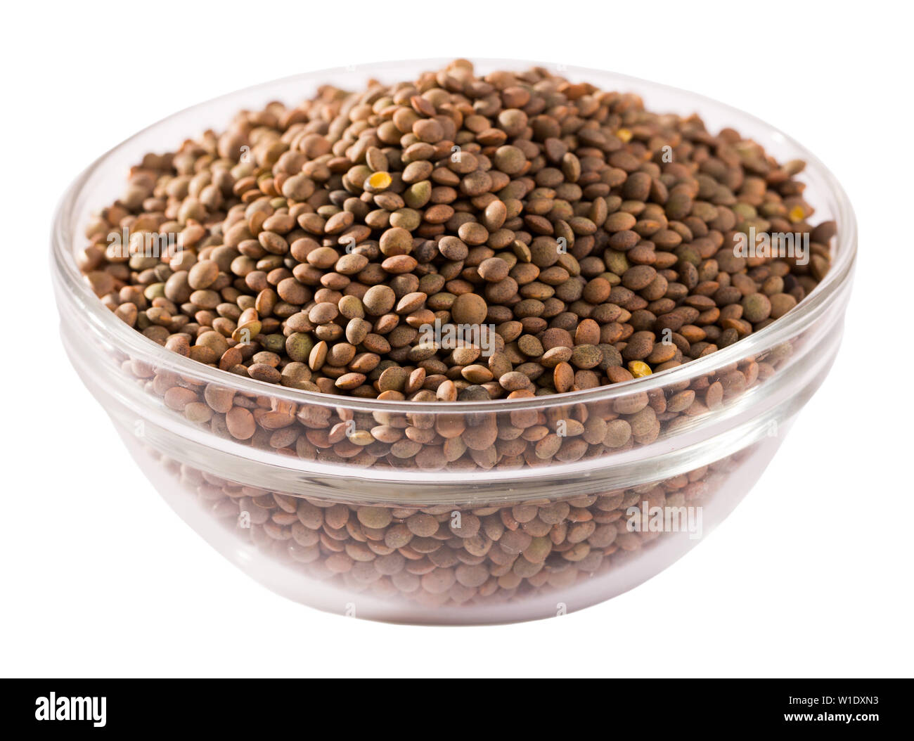 Lentils in a glass cup. Isolated over white background Stock Photo - Alamy