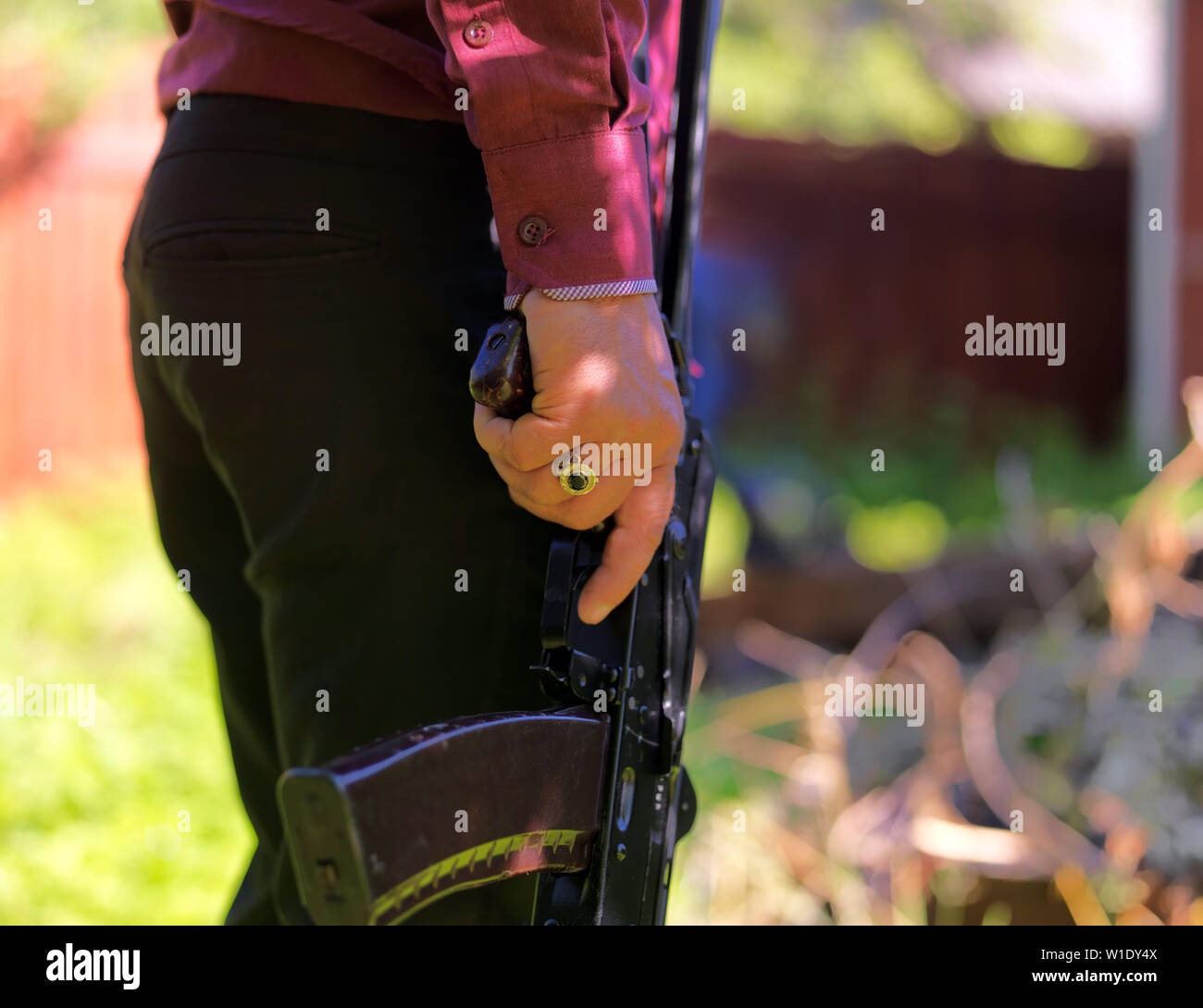 Man finger on trigger gun hi-res stock photography and images - Alamy