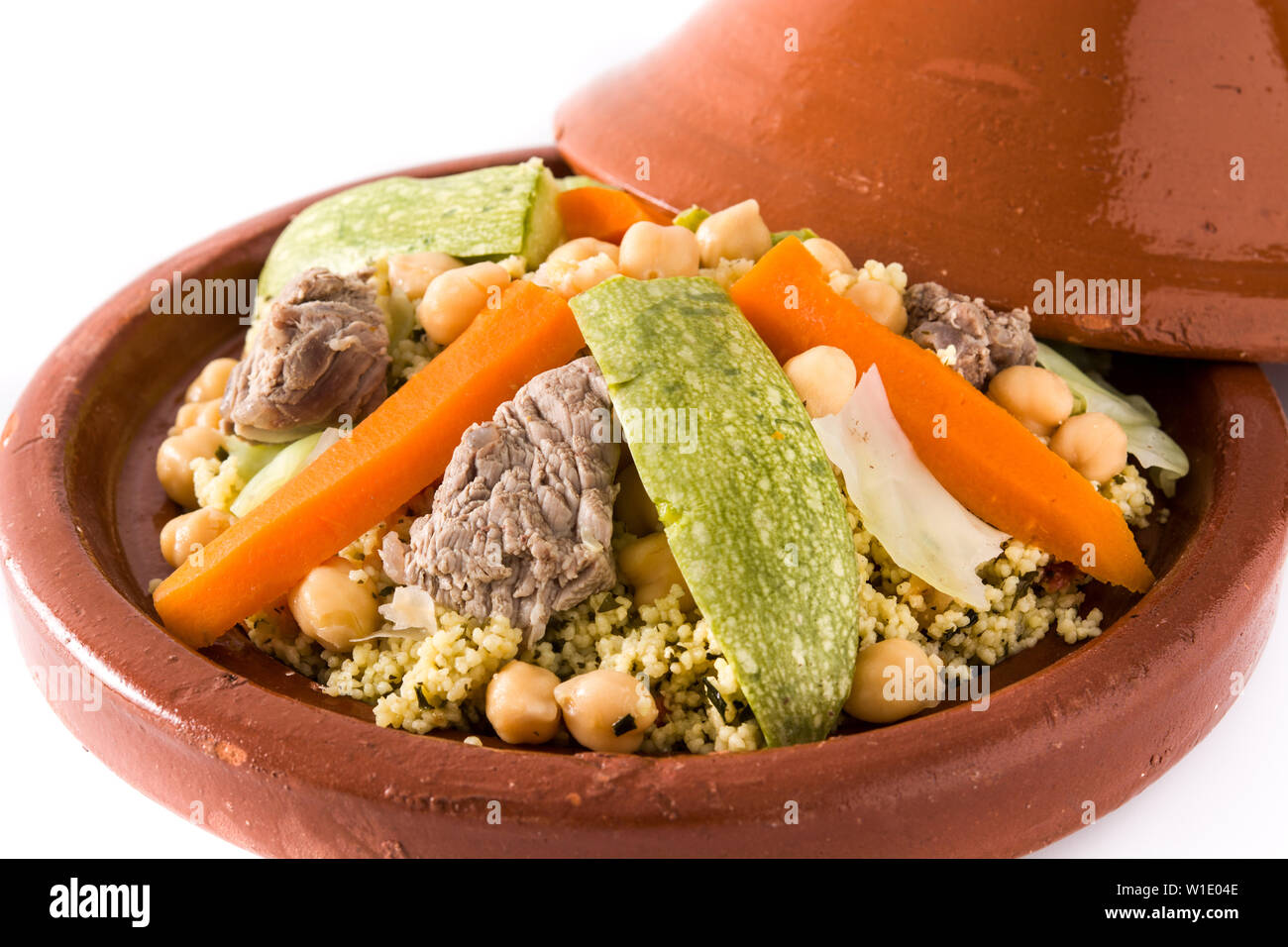 Traditional tajine with vegetables, chickpeas, meat and couscous ...