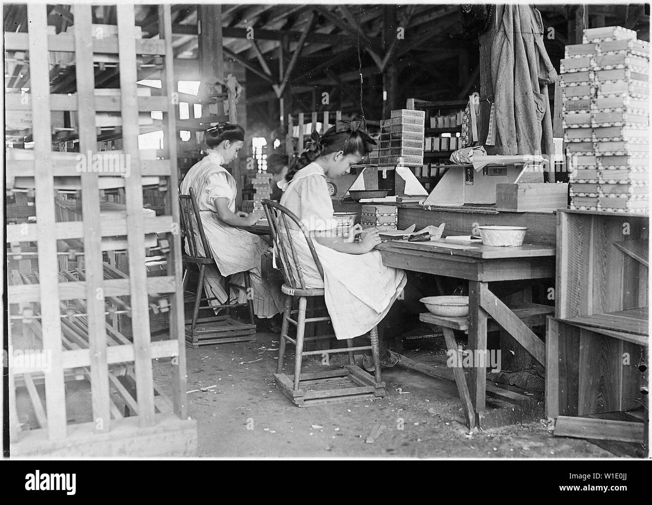 Girl working in Box Factory. I saw 10 small boys and girls working. Has ...