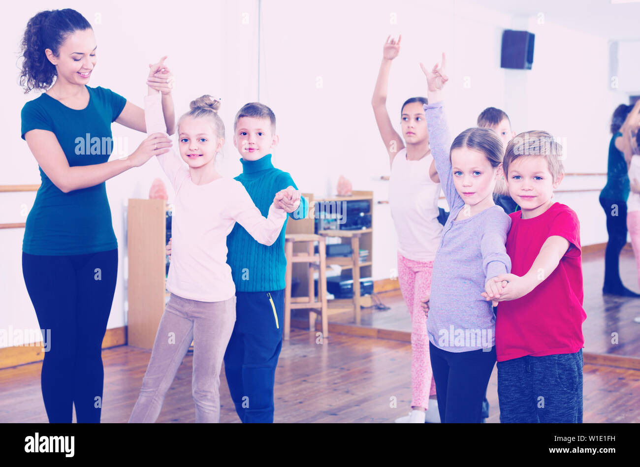 Group of positive person dancing tango in dance studio Stock Photo - Alamy
